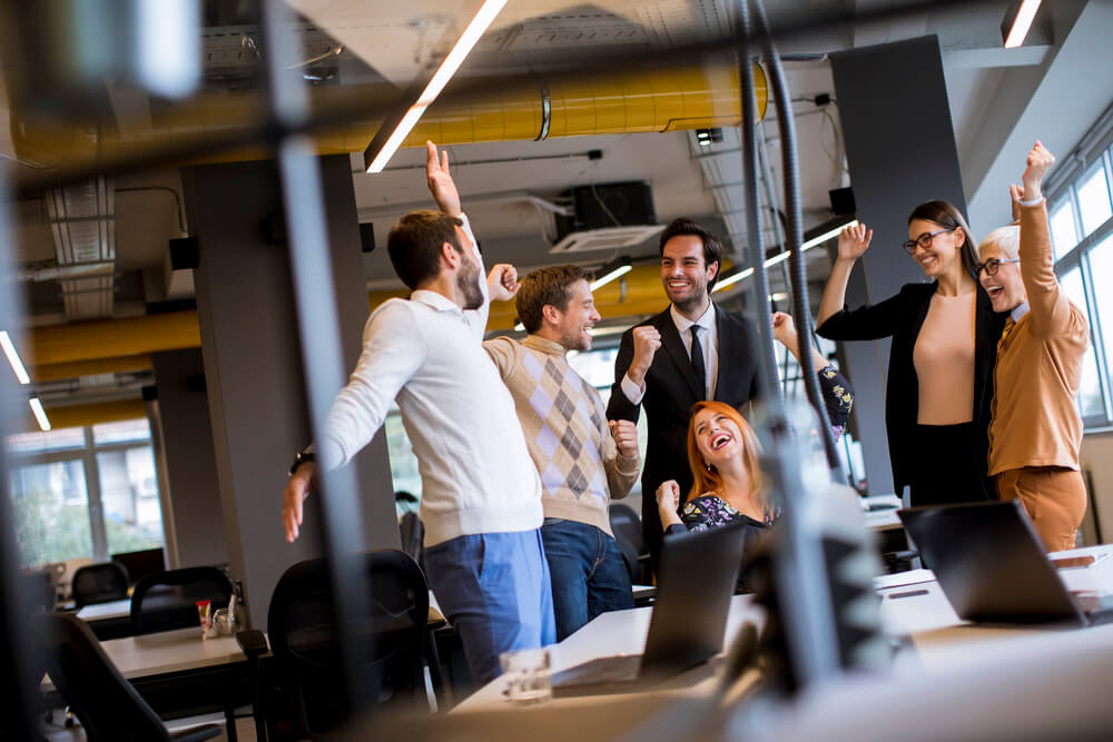 How To Boost Employee Morale: 5 Factors & 5 Essential Strategies